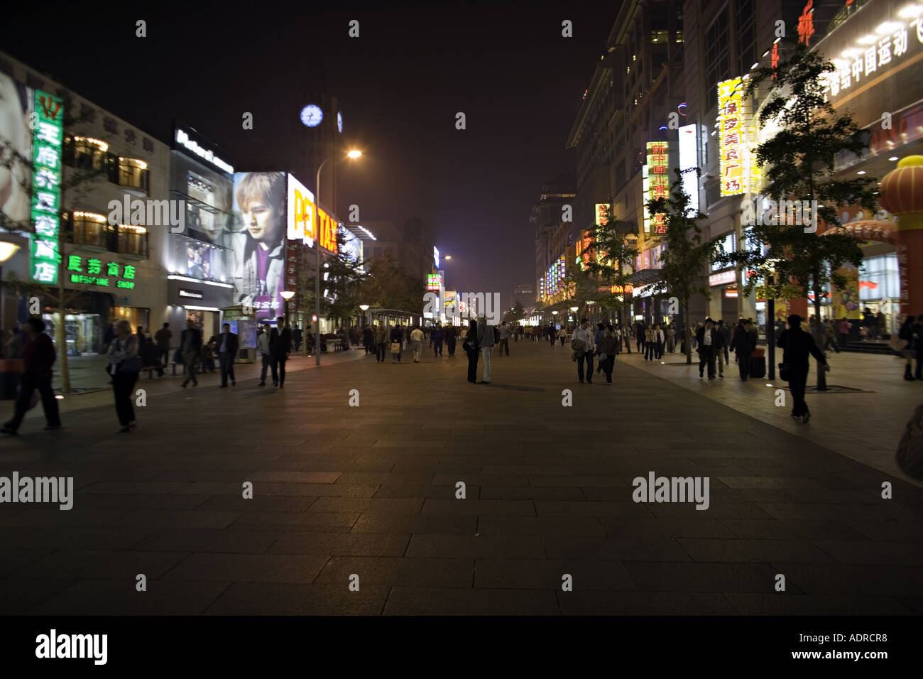 CHINA BEIJING Night scene of neon lights on a busy street in Beijing ...