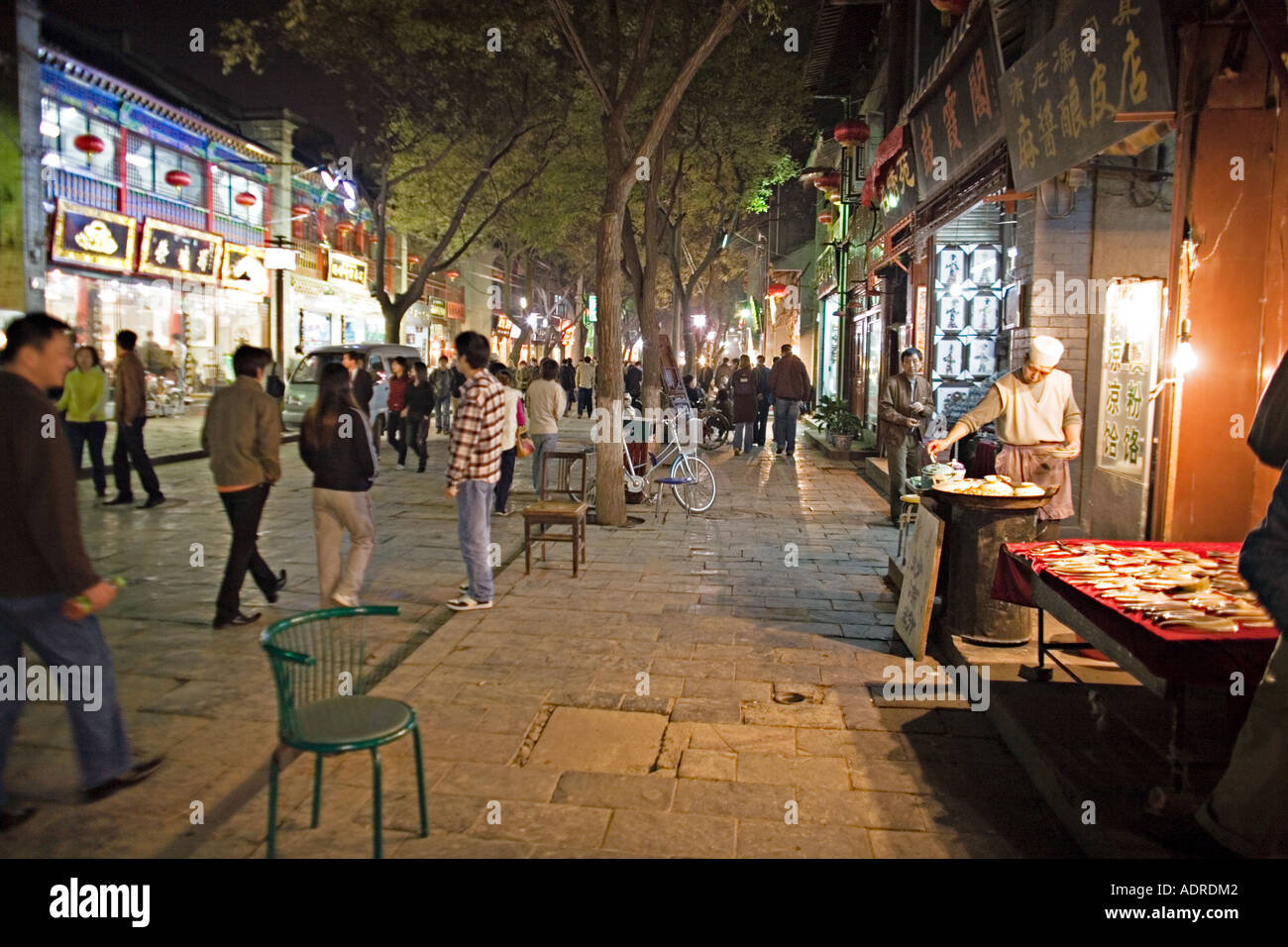 CHINA XIAN Night scene of busy street in the Muslim Quarter of old Xi ...