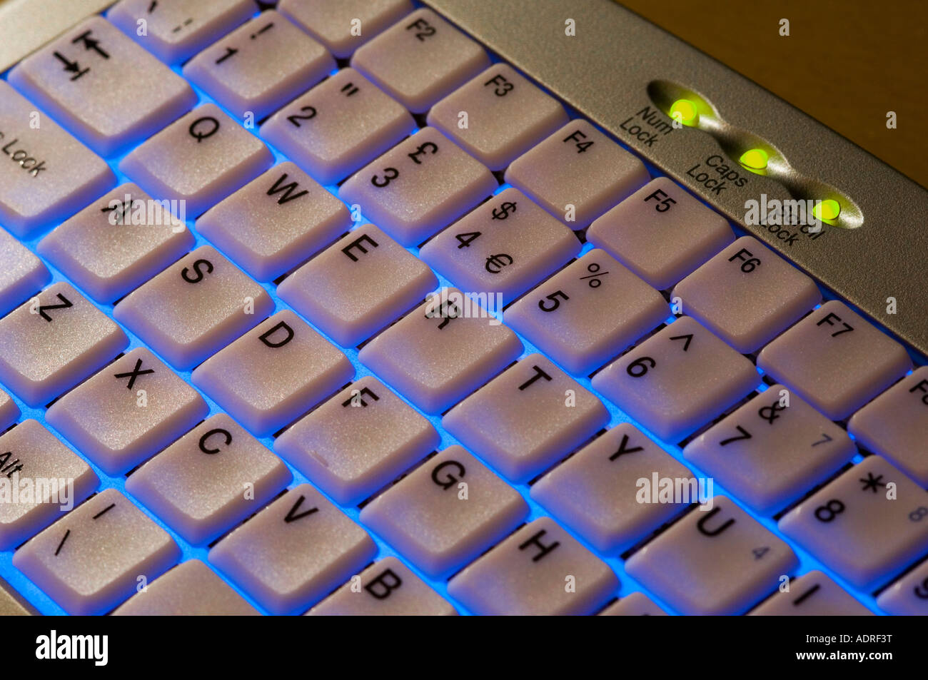 Illuminated computer keyboard Stock Photo - Alamy