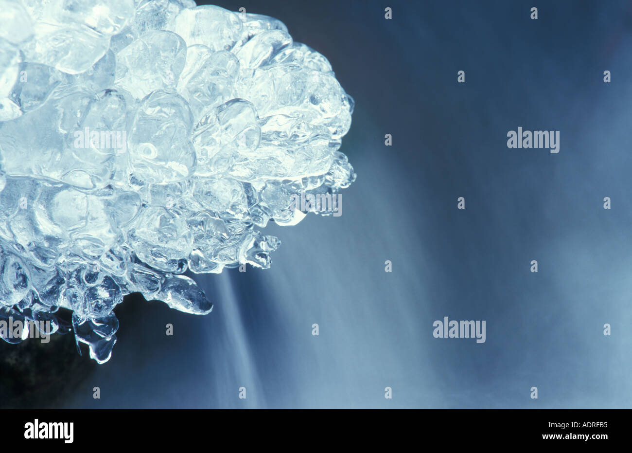 Ice formation in front of a cascade Stock Photo - Alamy