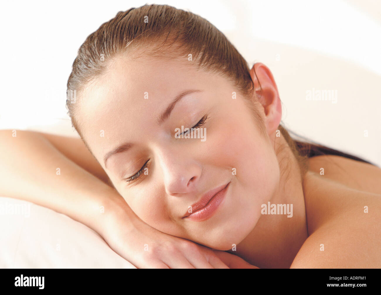 Female hand resting on cheek hi-res stock photography and images - Alamy