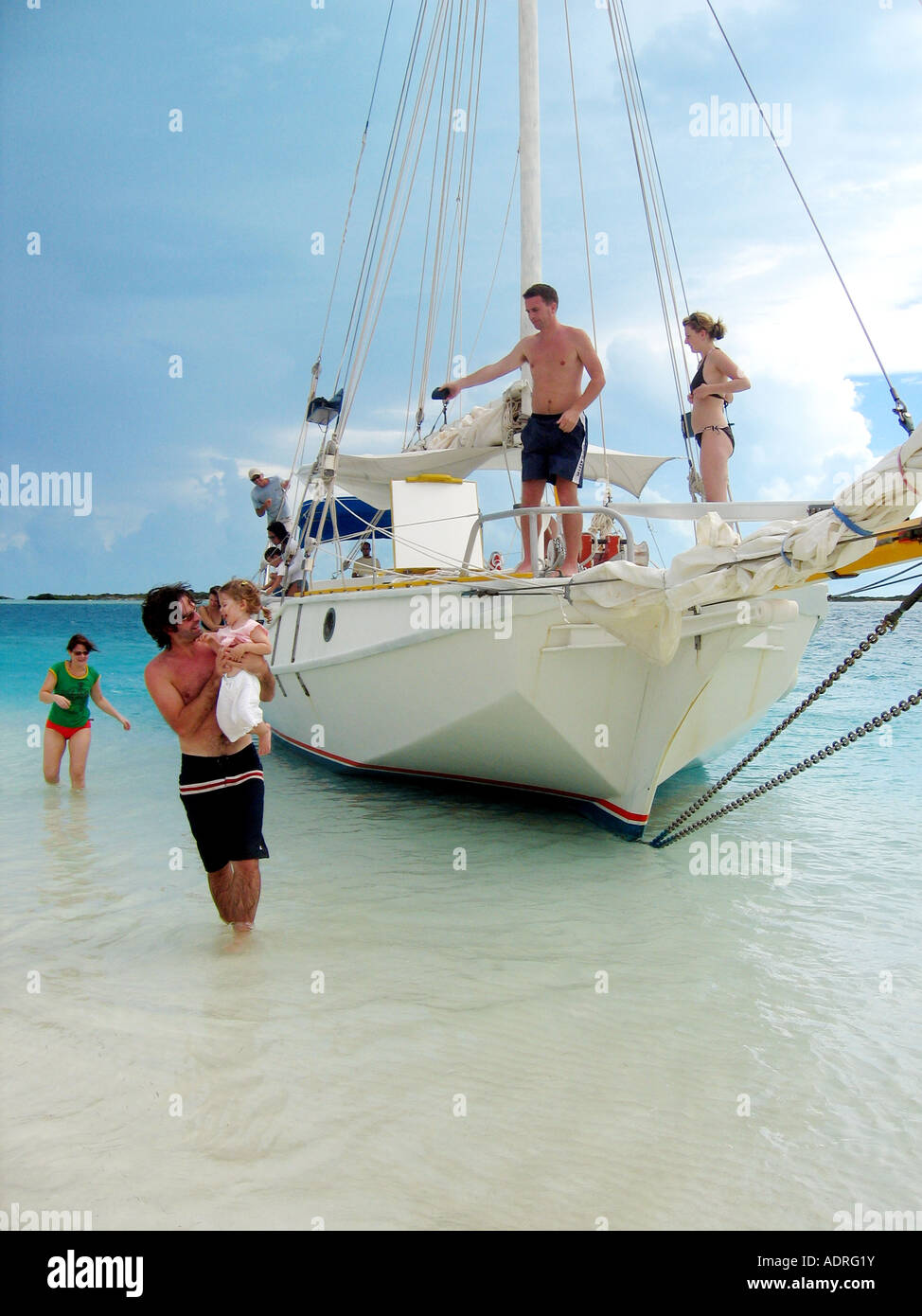 Family getting off their boat Turks and Caicos Island Caribbean Stock ...