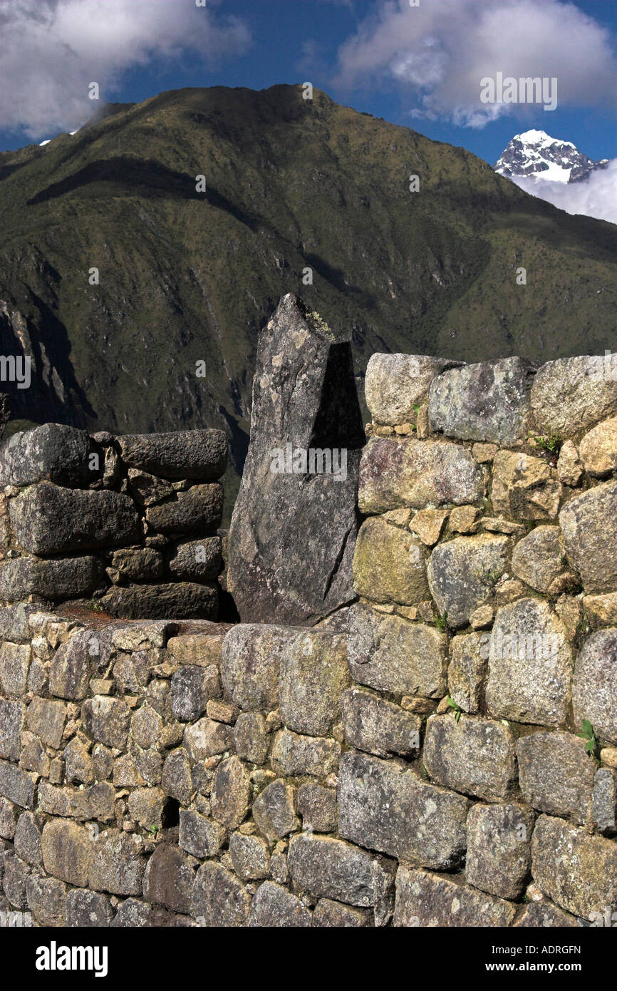 Ancient Inca ruins and carved stone pillar, [Huayna Picchu], Peru ...