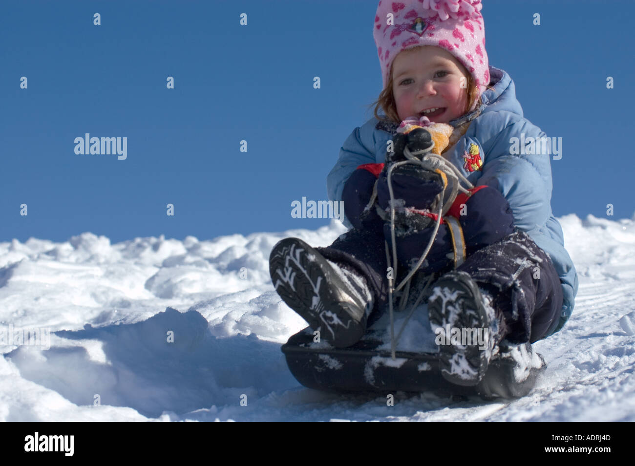 Kids on sleigh hi-res stock photography and images - Alamy