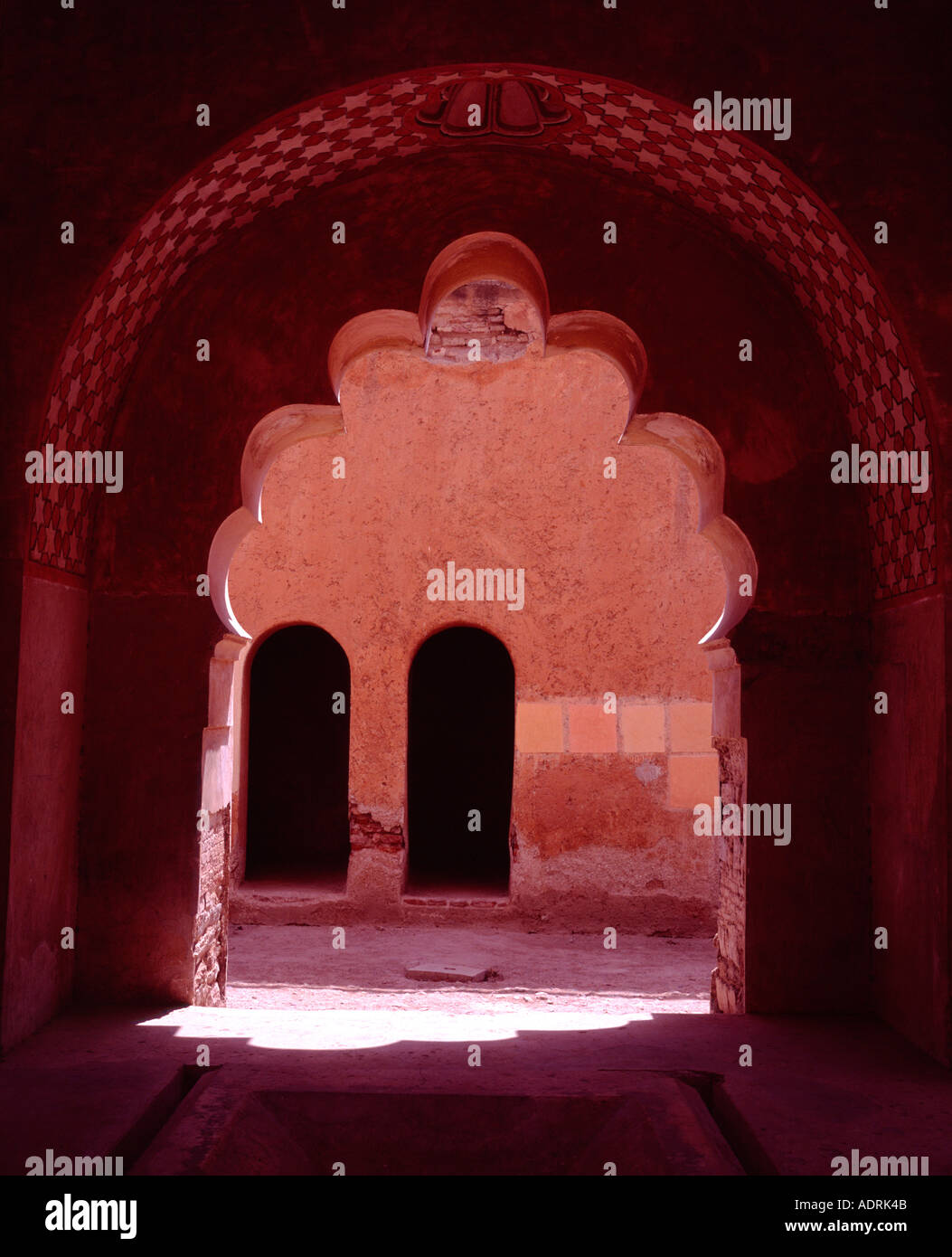 View of Koubba el Badiyin through and archway Marrakech Morocco Stock ...