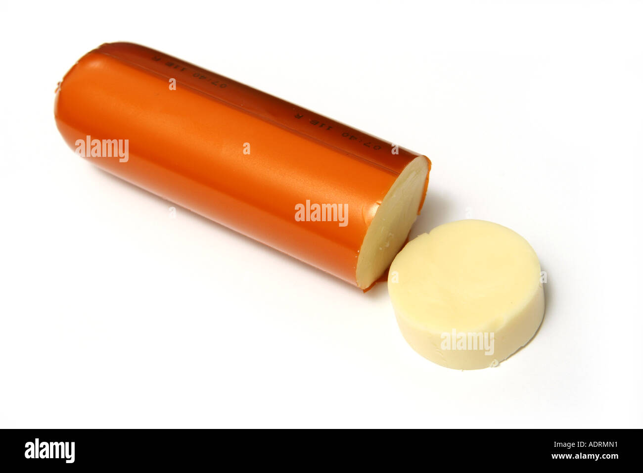 Processed smoked cheese on a white studio background Stock Photo - Alamy