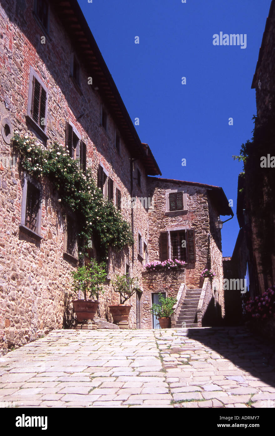 Street scene in the medieval fortified hamlet of Volpaia in the Chianti ...