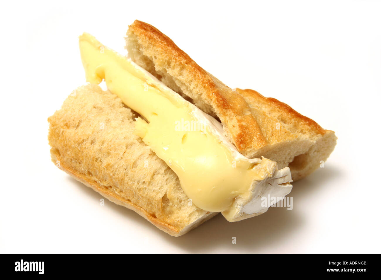 Brie cheese on french bread with a white studio background Stock Photo ...