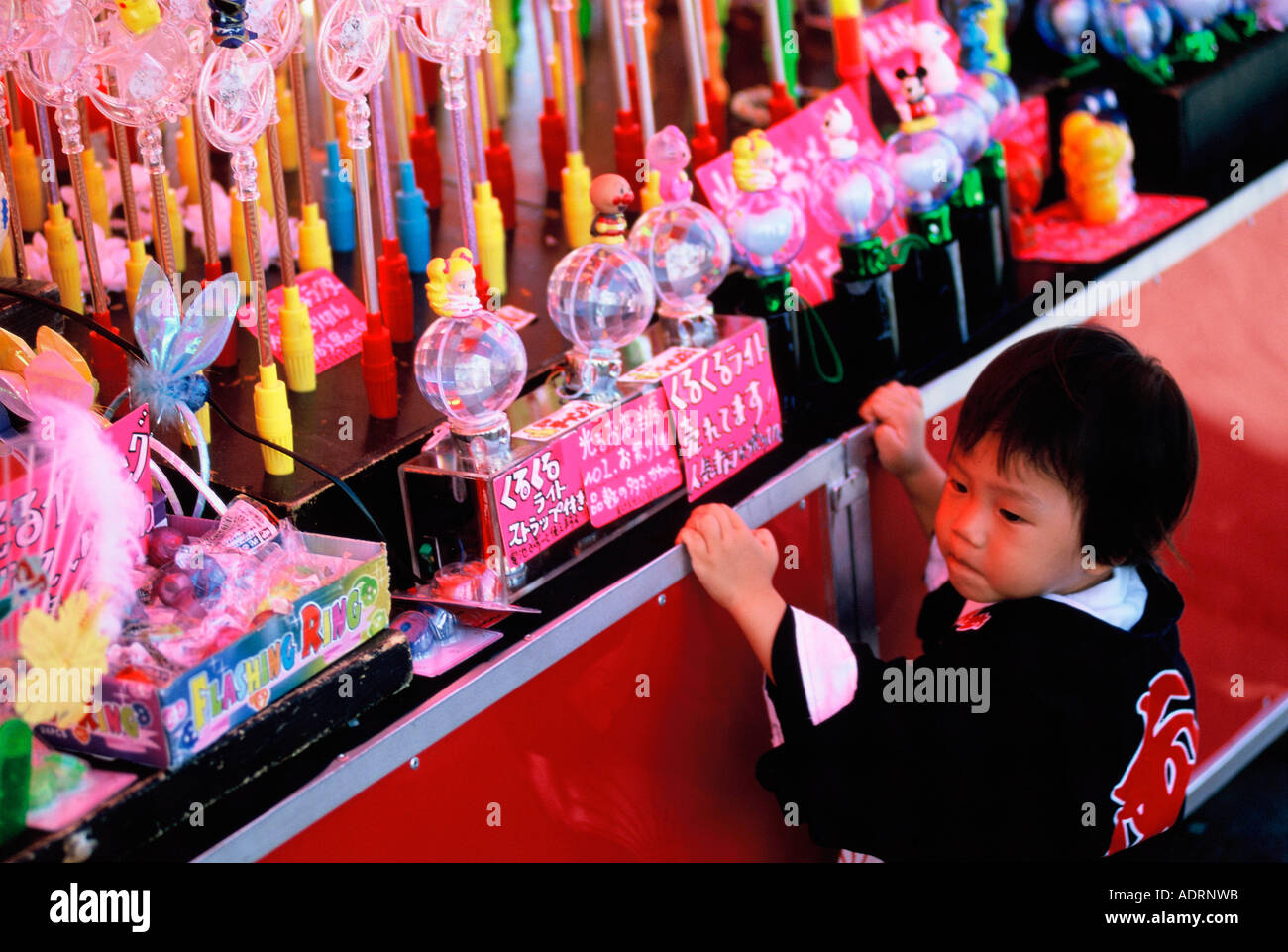 A kid at a toy stall Kishiwada Festival Osaka Japan Stock Photo - Alamy