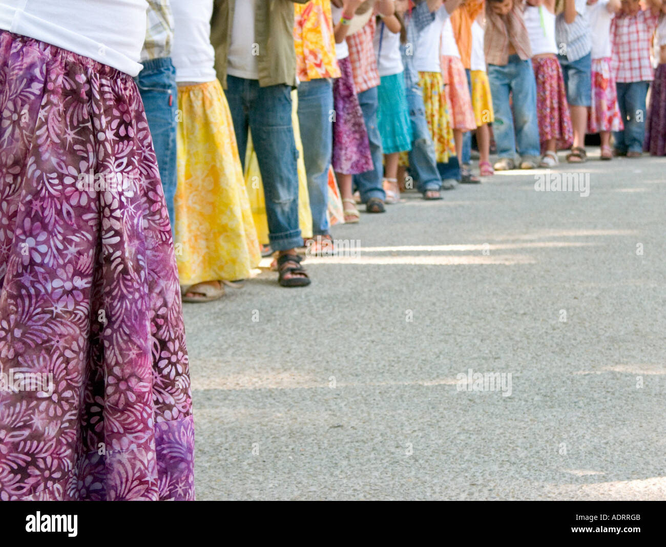 a cropped view of a row of children's legs Stock Photo - Alamy