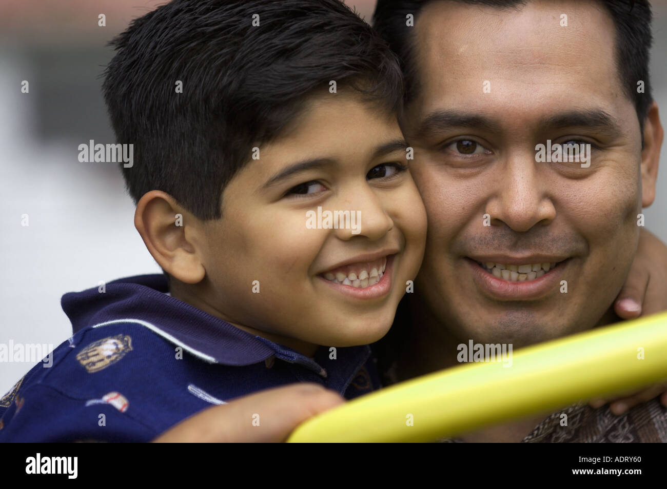 Hispanic father and son together Stock Photo - Alamy