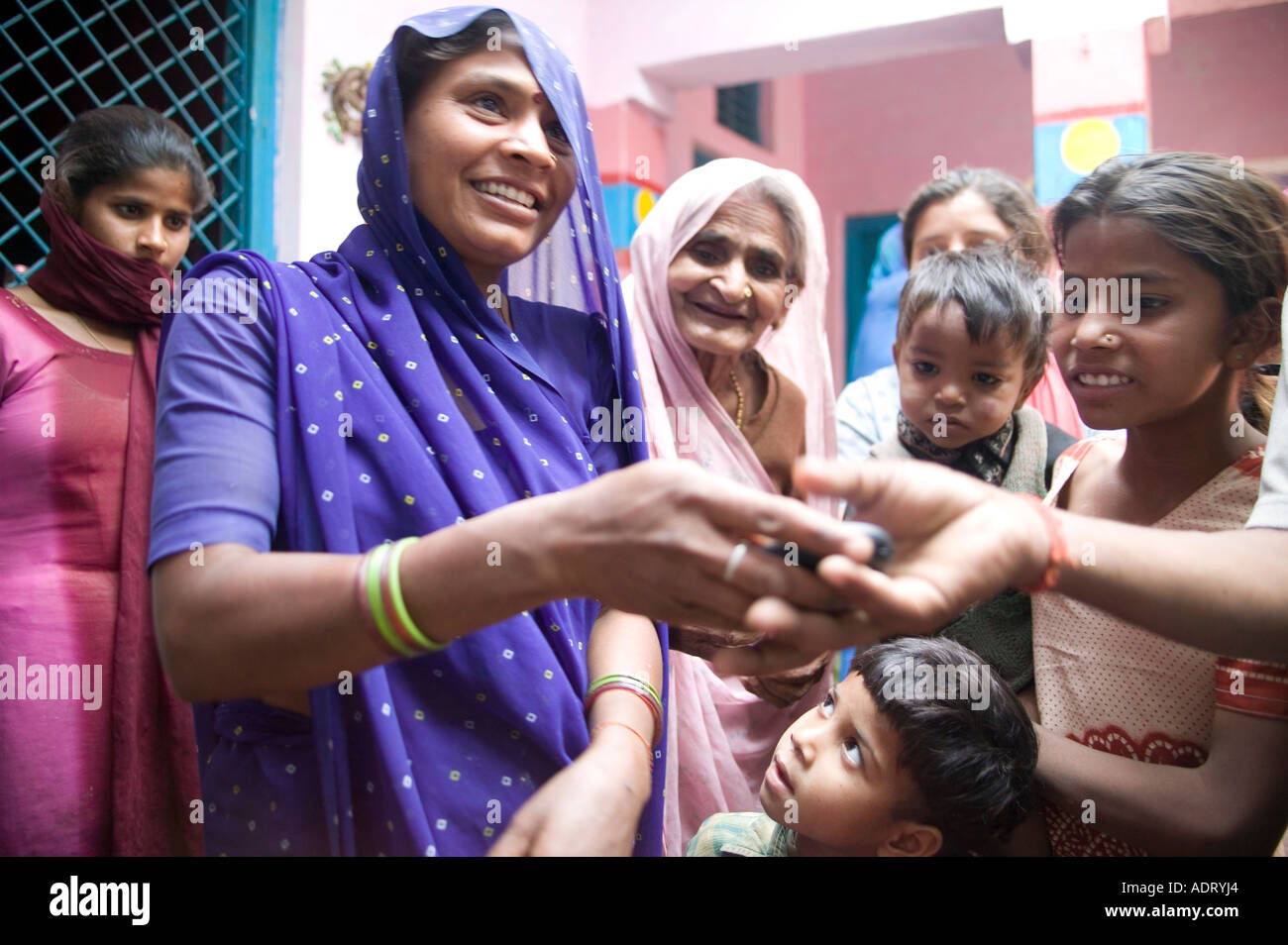 India rural community mobile phone hi-res stock photography and images ...