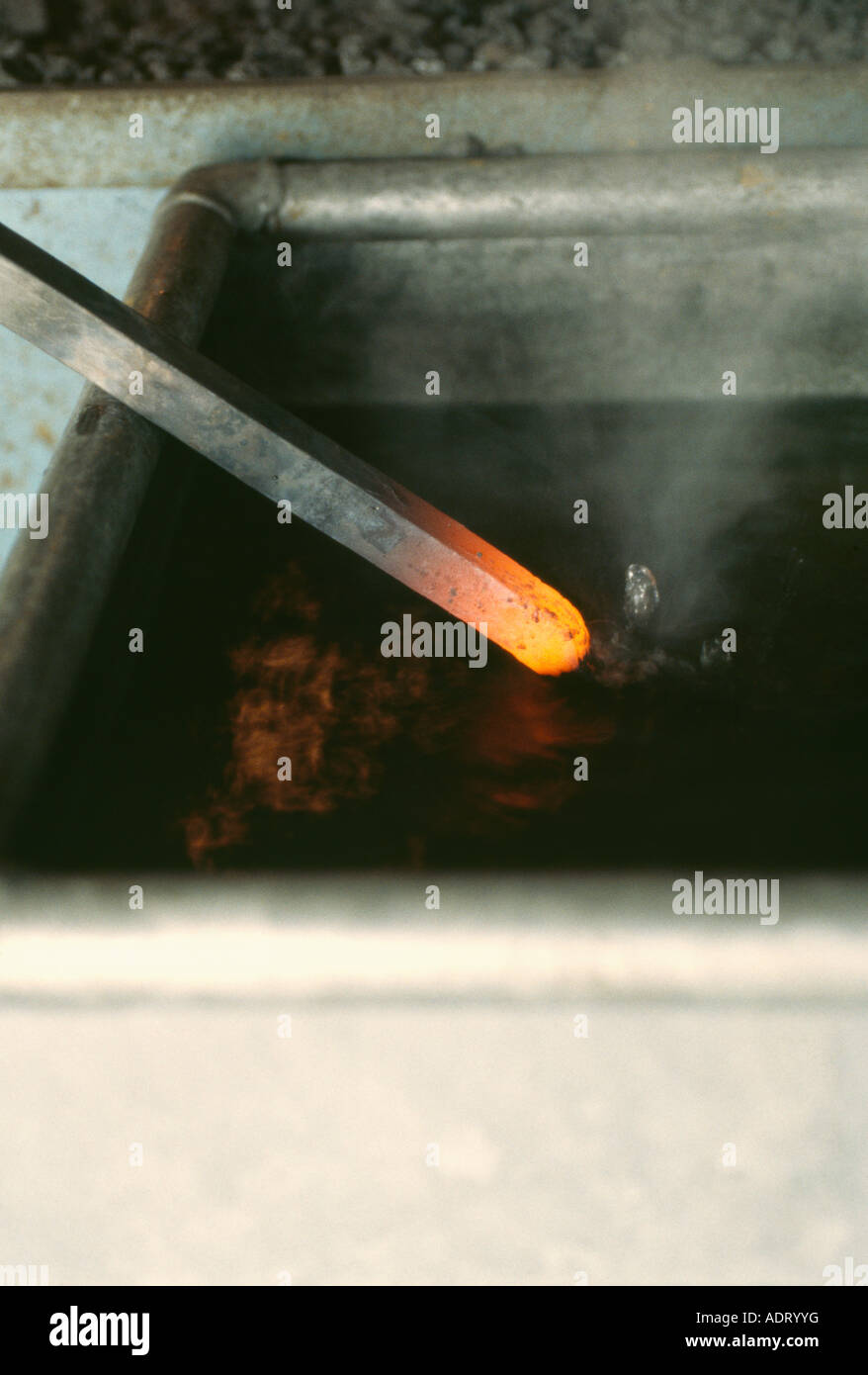 Close up of red hot steel in blacksmiths forge Stock Photo - Alamy