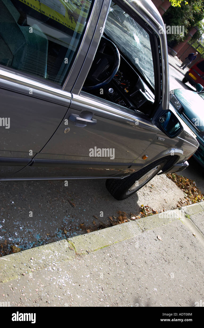 volvo car with smashed windscreen and smashed drivers door window ...