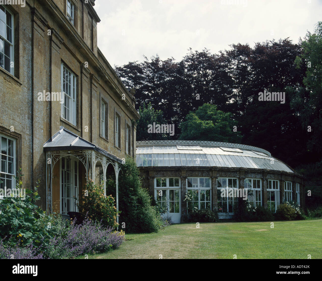 Large Victorian country house with traditional curved conservatory ...