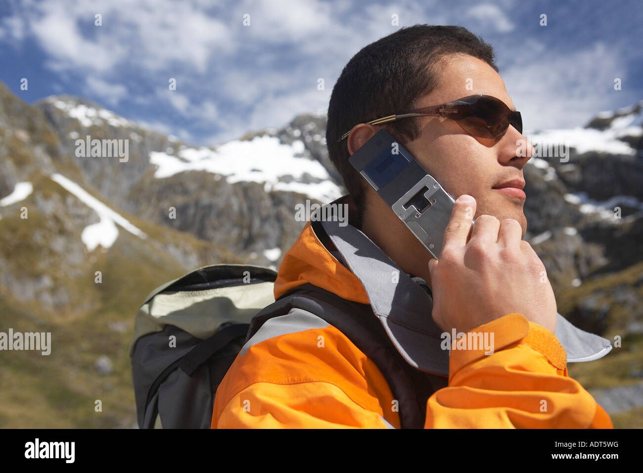 Man using walkie-talkie in mountains Stock Photo - Alamy