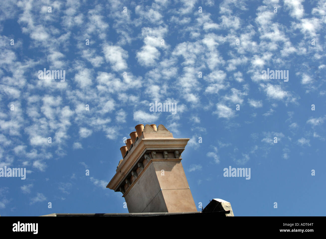 A Victorian Chimney stack surrounded by wispy clouds Stock Photo - Alamy