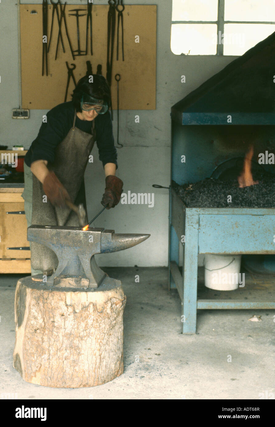 Woman blacksmith working in forge hi-res stock photography and images ...