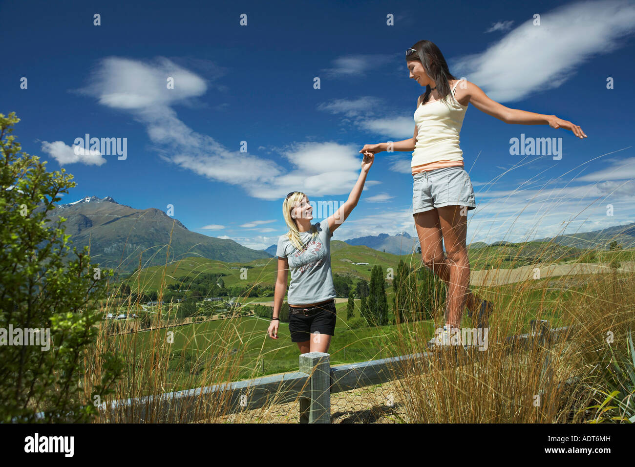 Woman helping another woman hi-res stock photography and images - Alamy