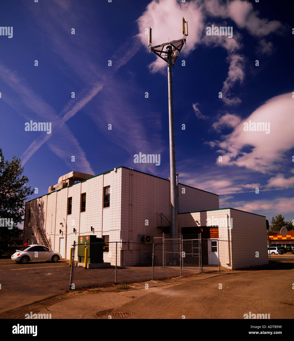 Cell phone tower in the city Stock Photo - Alamy