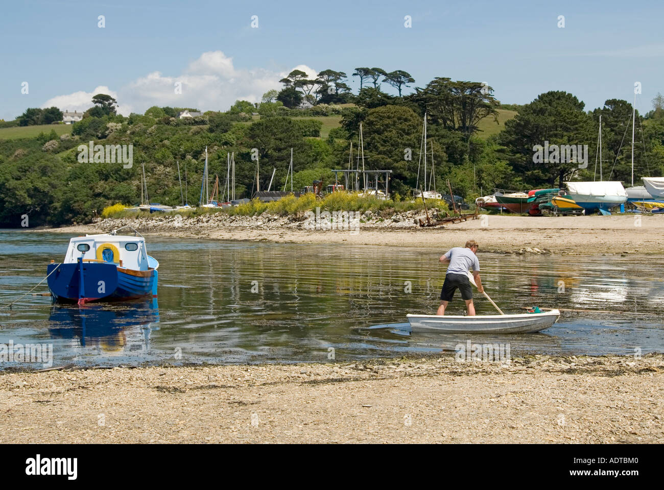 Carrick Roads at St Just in Roseland back view man standing in small ...