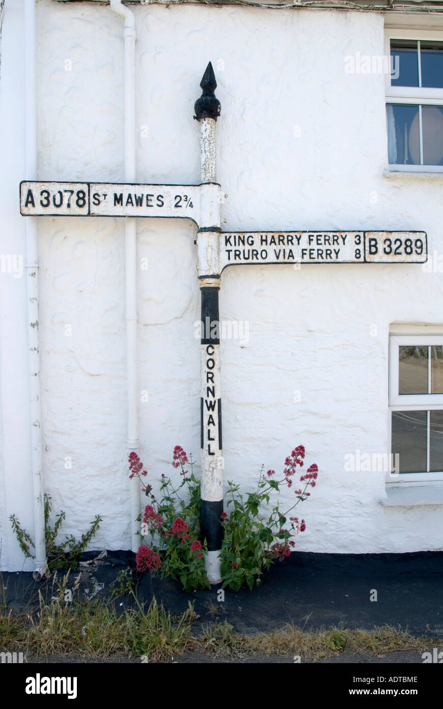 Traditional finger post road direction sign Stock Photo - Alamy