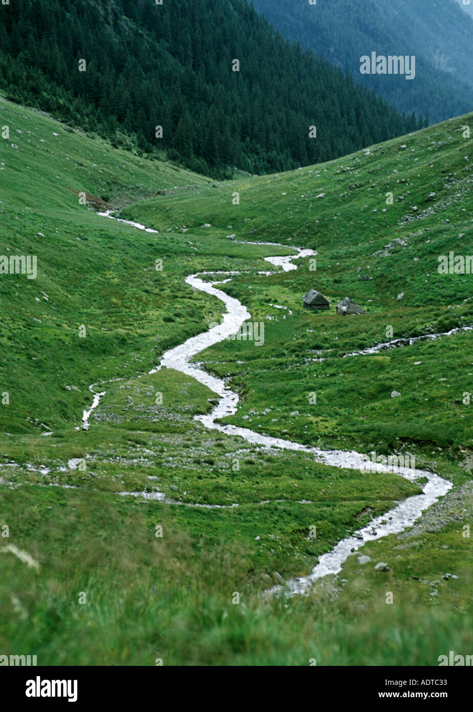 mountain valley with wooden house Fagaras Mountains Romania Stock Photo ...
