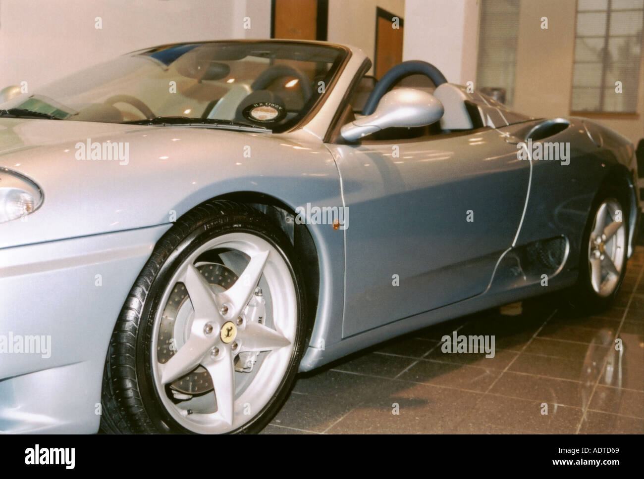 Silver Ferrari side view Stock Photo - Alamy