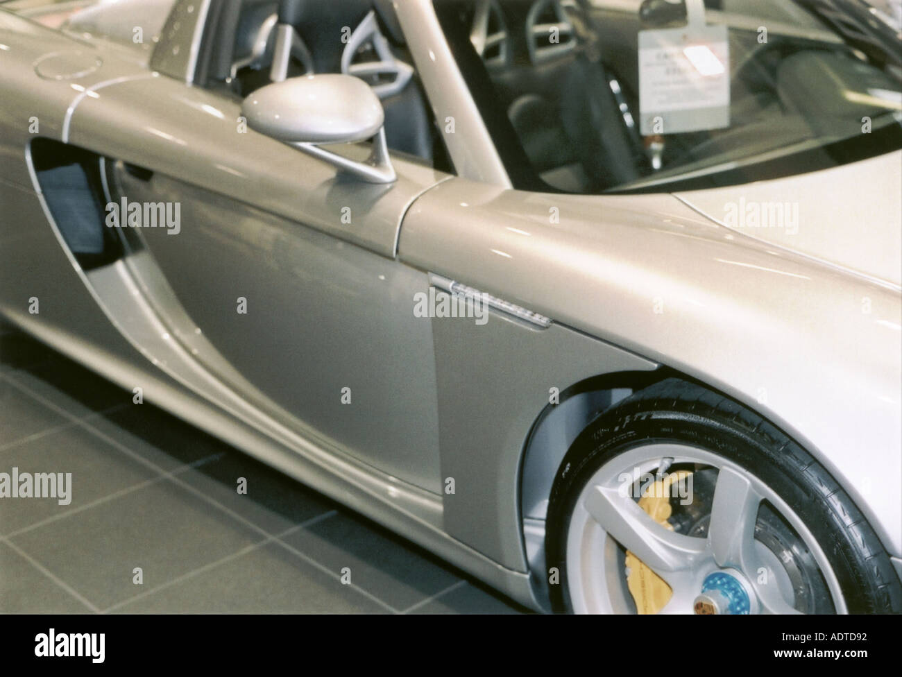 Porsche Carrera GT side view showing air scoops and mirror detailing ...
