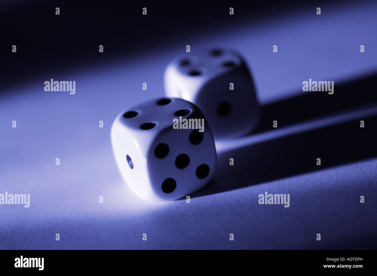 Pair of dice showing 2 fours Stock Photo - Alamy