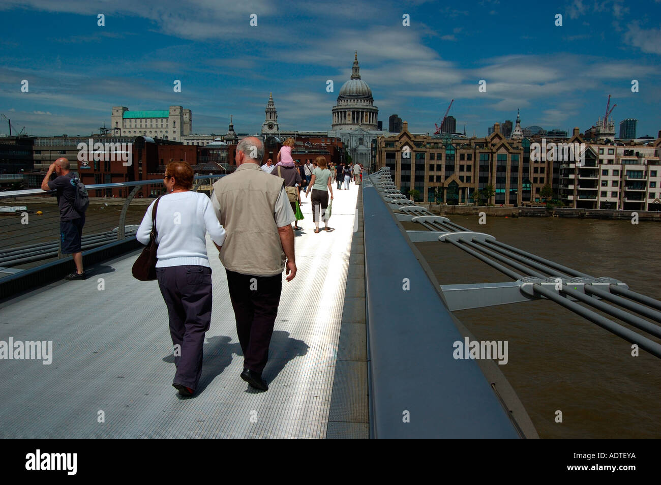 Crossing the Millennium Bridge London England Stock Photo - Alamy