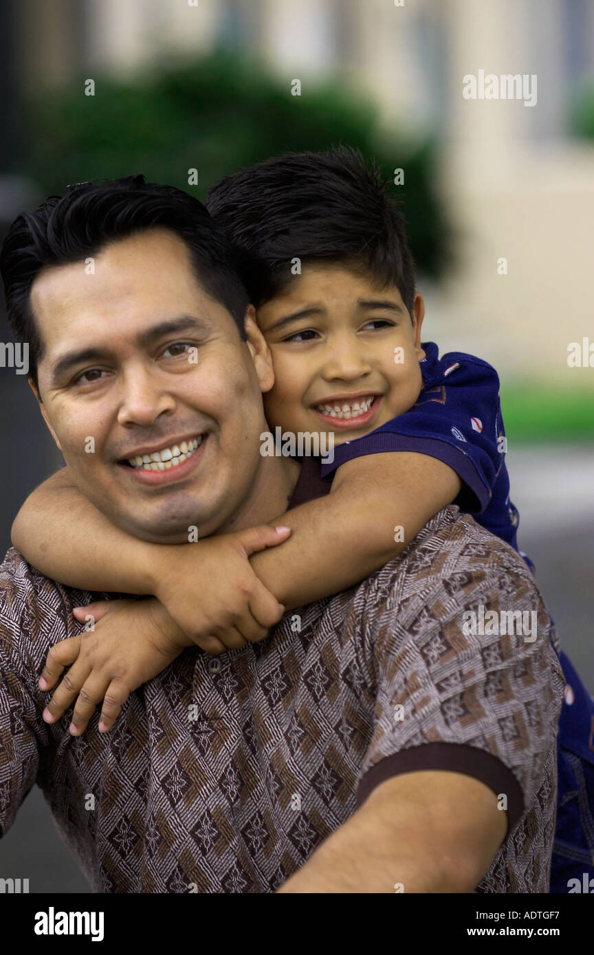 happy Hispanic father with thoughtful son Stock Photo - Alamy