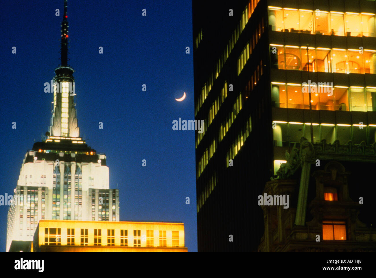 The Empire State Building and the First Republic Bank Building at night ...