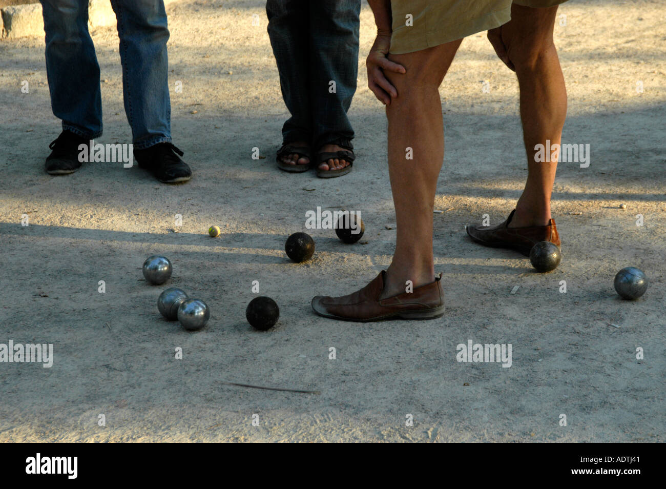 Men playing game of boules in La Place des Lices, St Tropez France ...