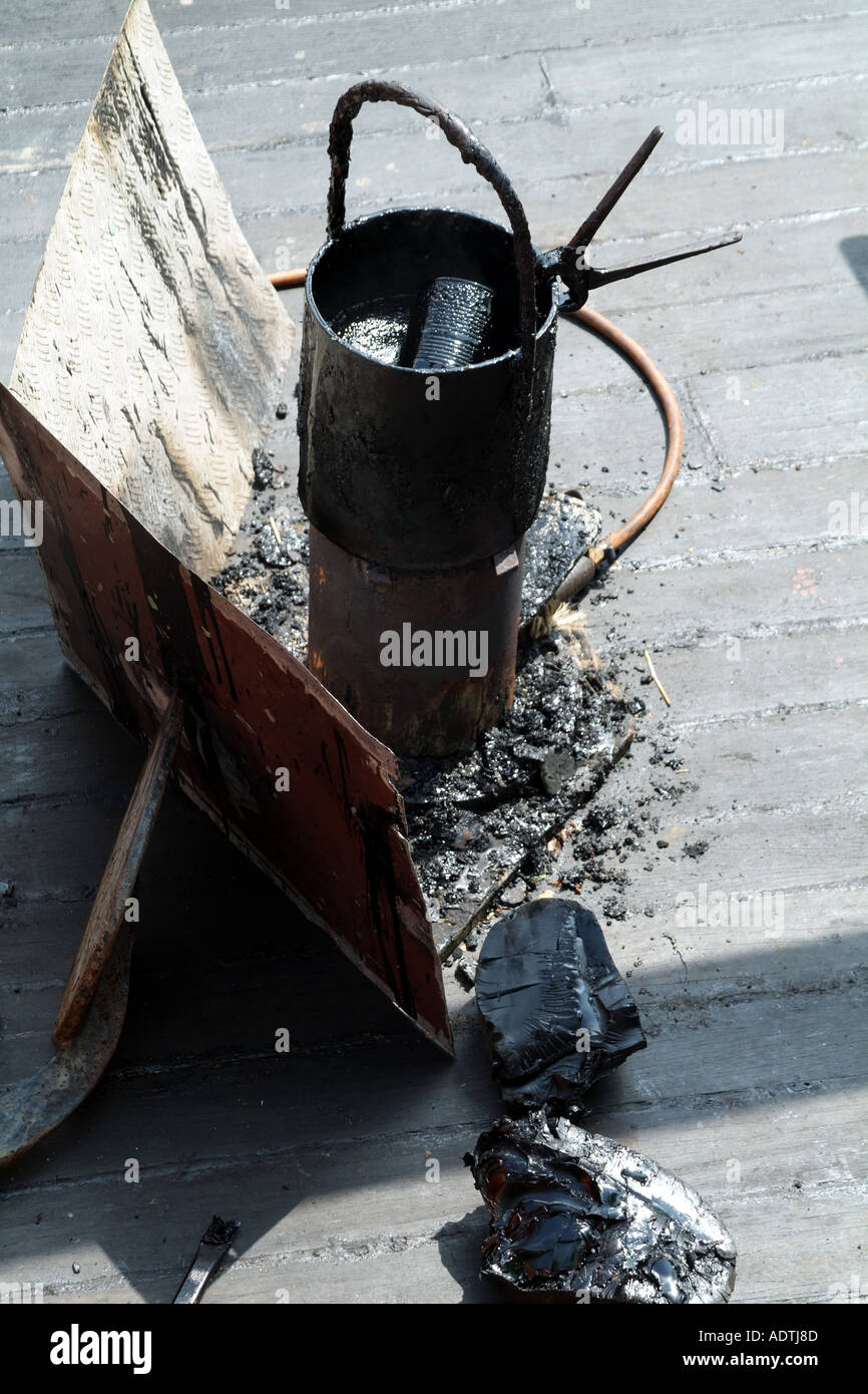 black tar in melting pot on ships deck Stock Photo - Alamy