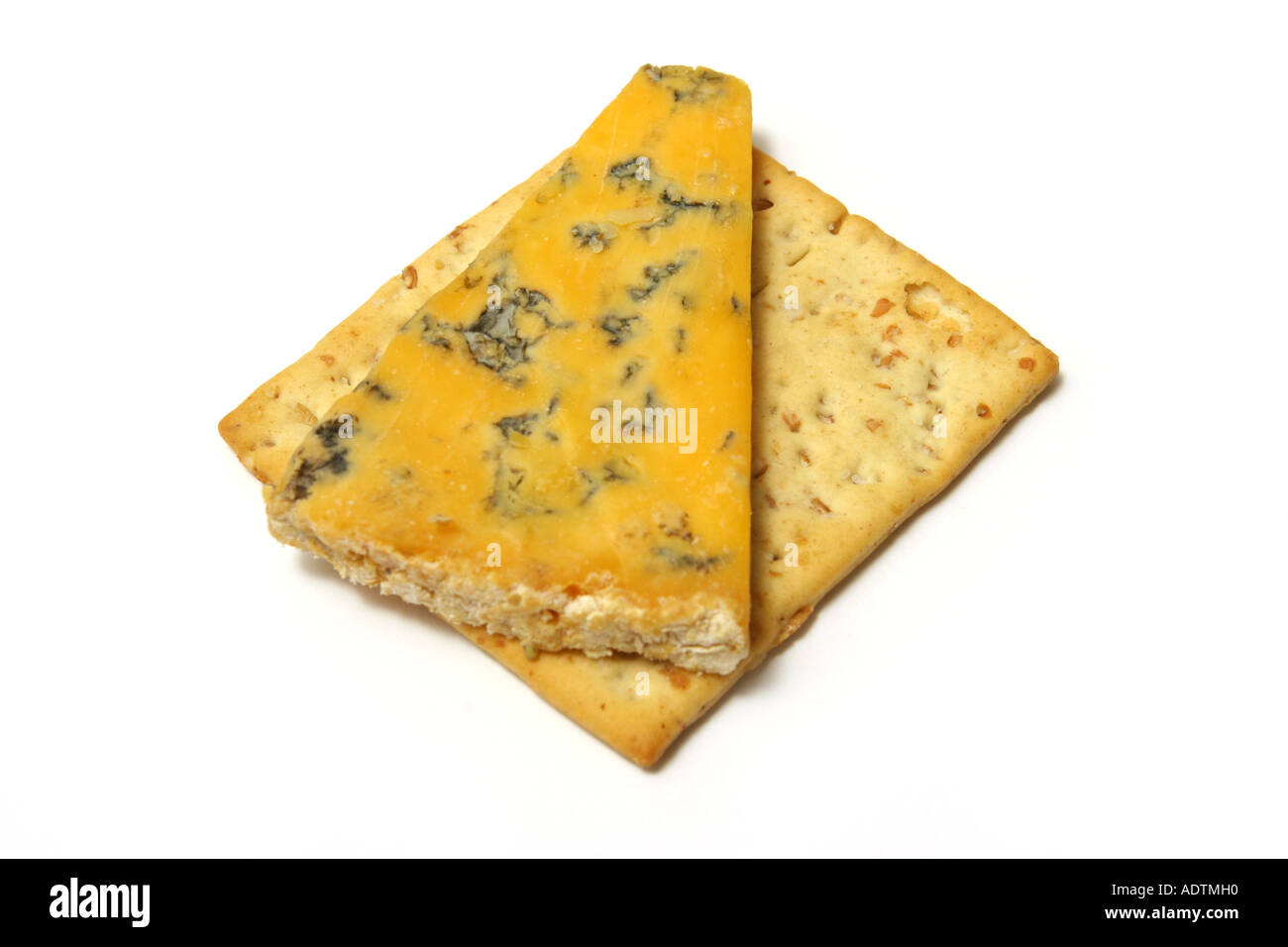 Red Stilton on a cheese biscuit isolated on a white studio background ...