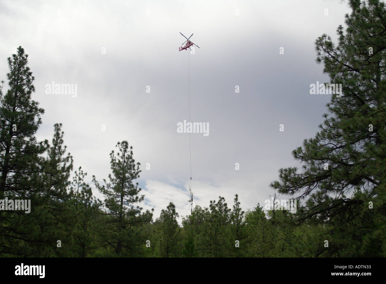 Helicopter logging hi-res stock photography and images - Alamy