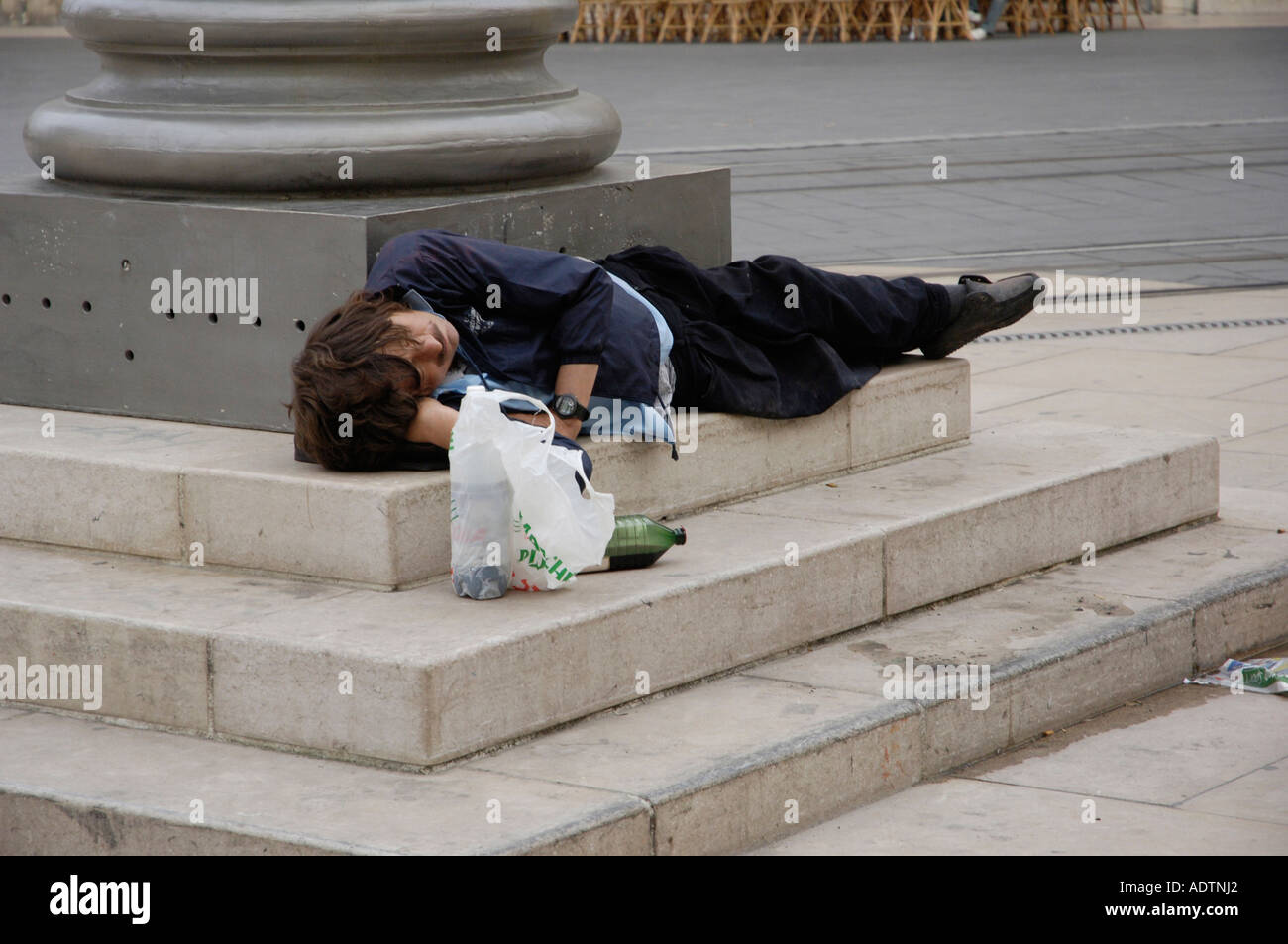 Down out tramp sleeping hi-res stock photography and images - Alamy