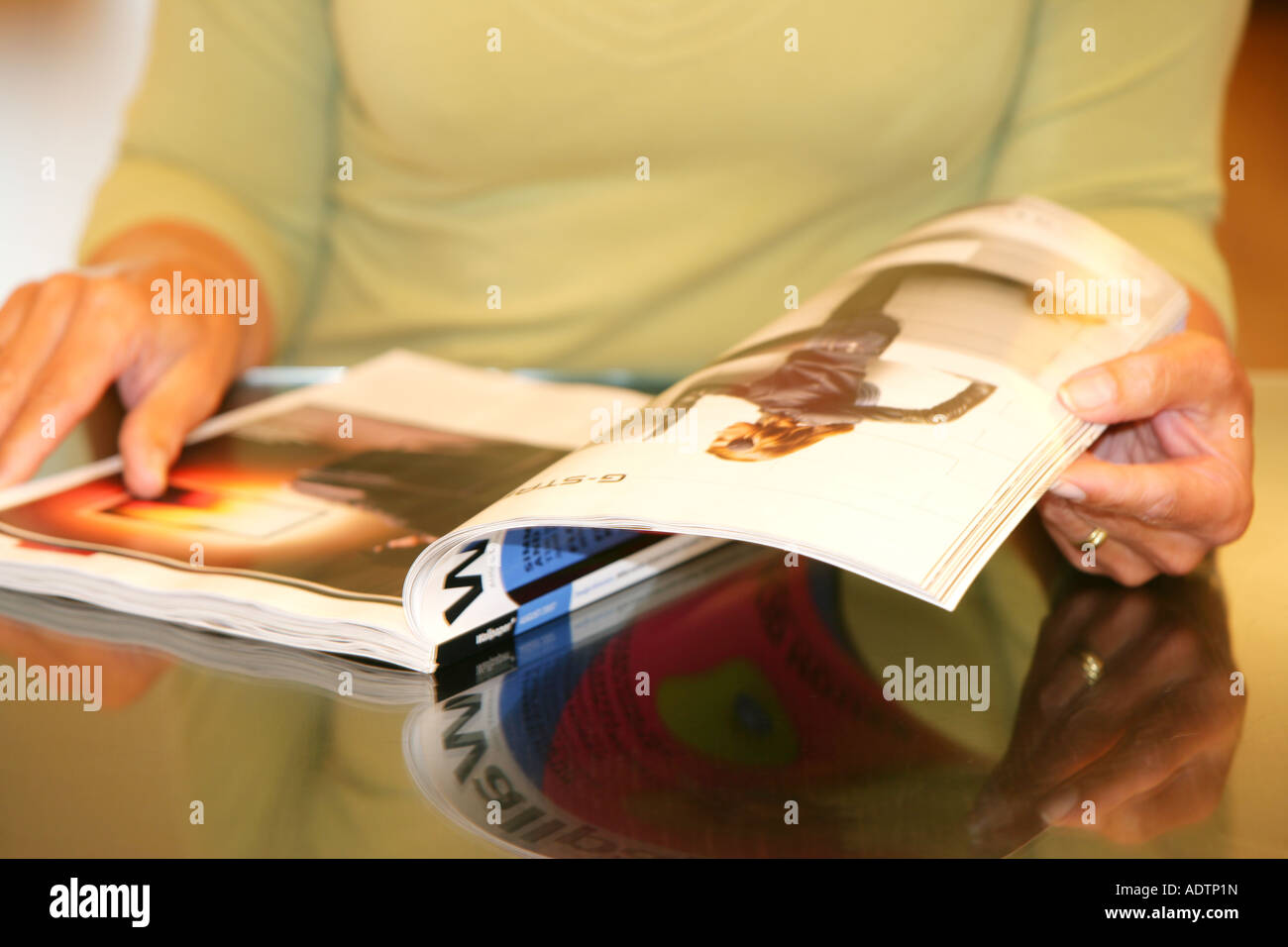Mature Woman Reading Magazine Model Released Stock Photo - Alamy