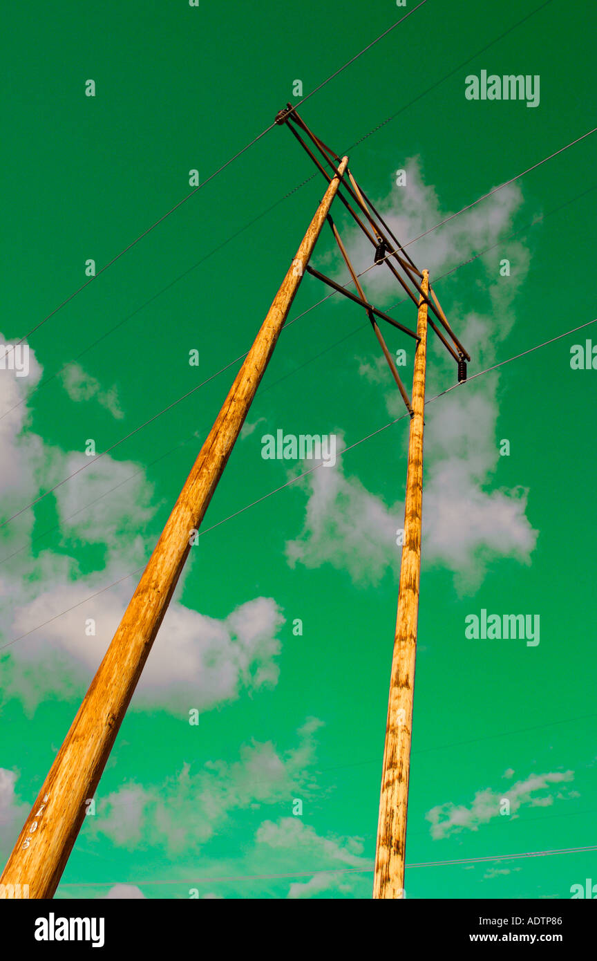 Telephone poles reaching up into the sky Stock Photo - Alamy