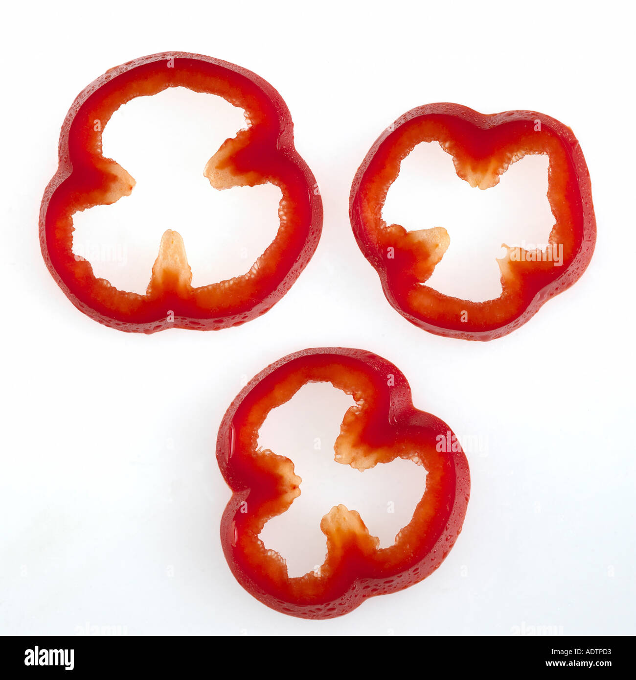 A trio of red pepper slices Stock Photo - Alamy