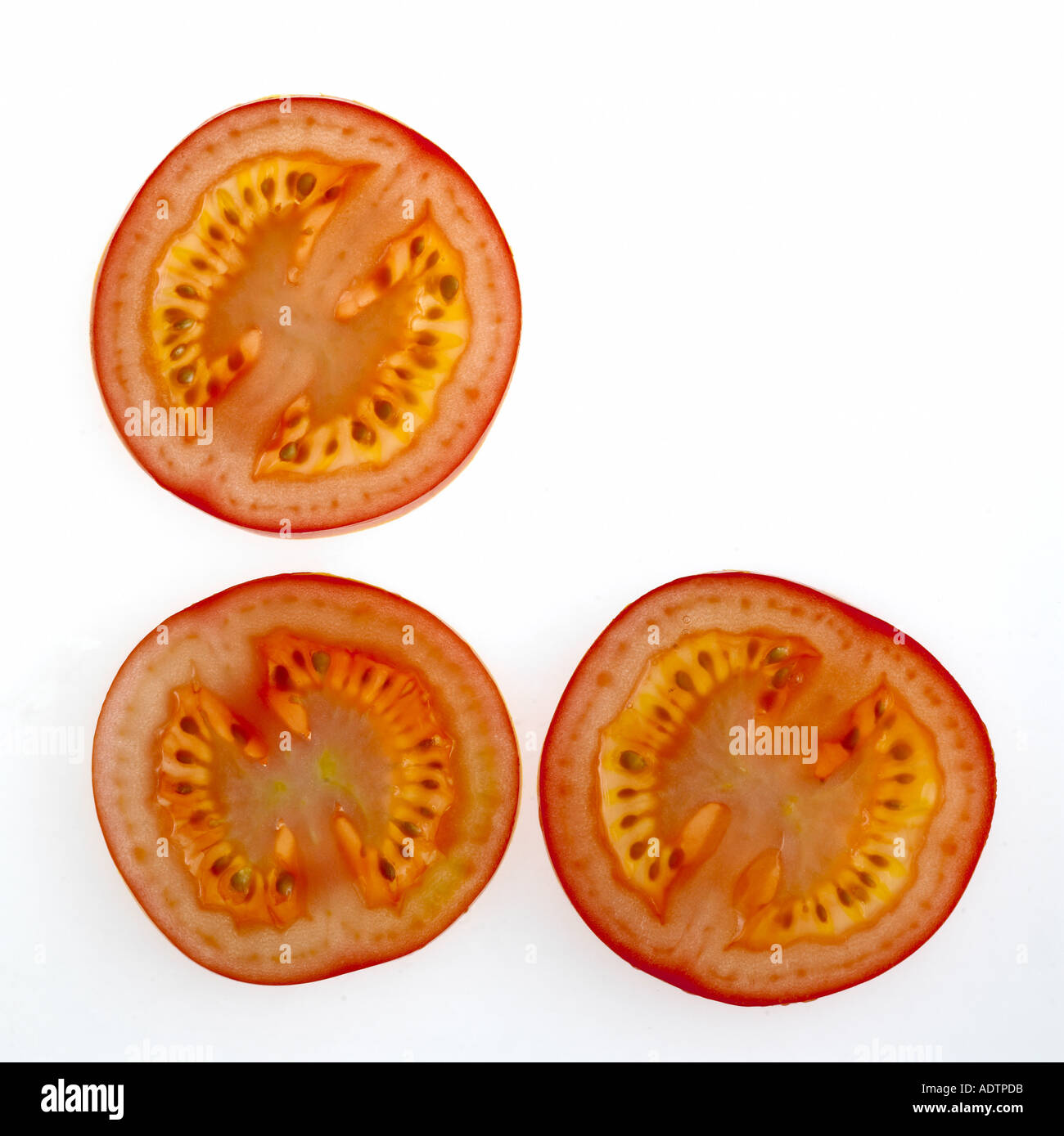 Three thin slices of tomato Stock Photo - Alamy