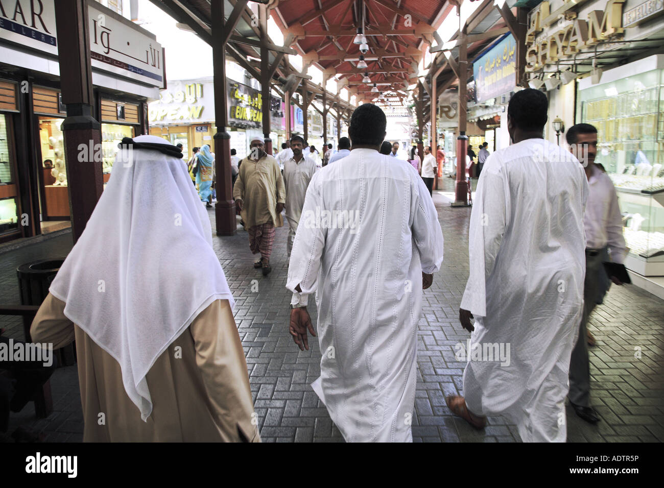 Arab men walking in dubai hi-res stock photography and images - Alamy