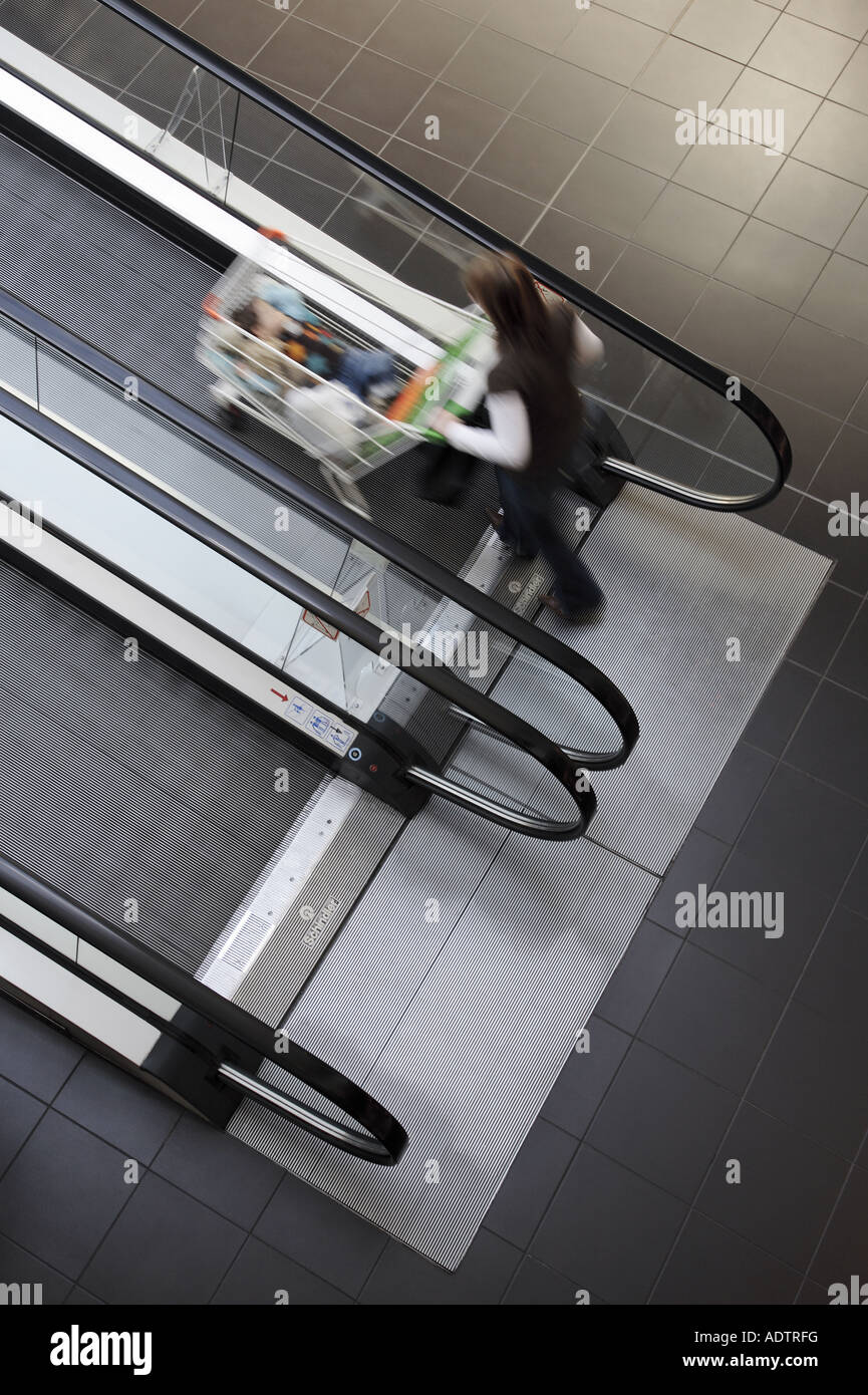 Shopping trolley escalator hi-res stock photography and images - Alamy