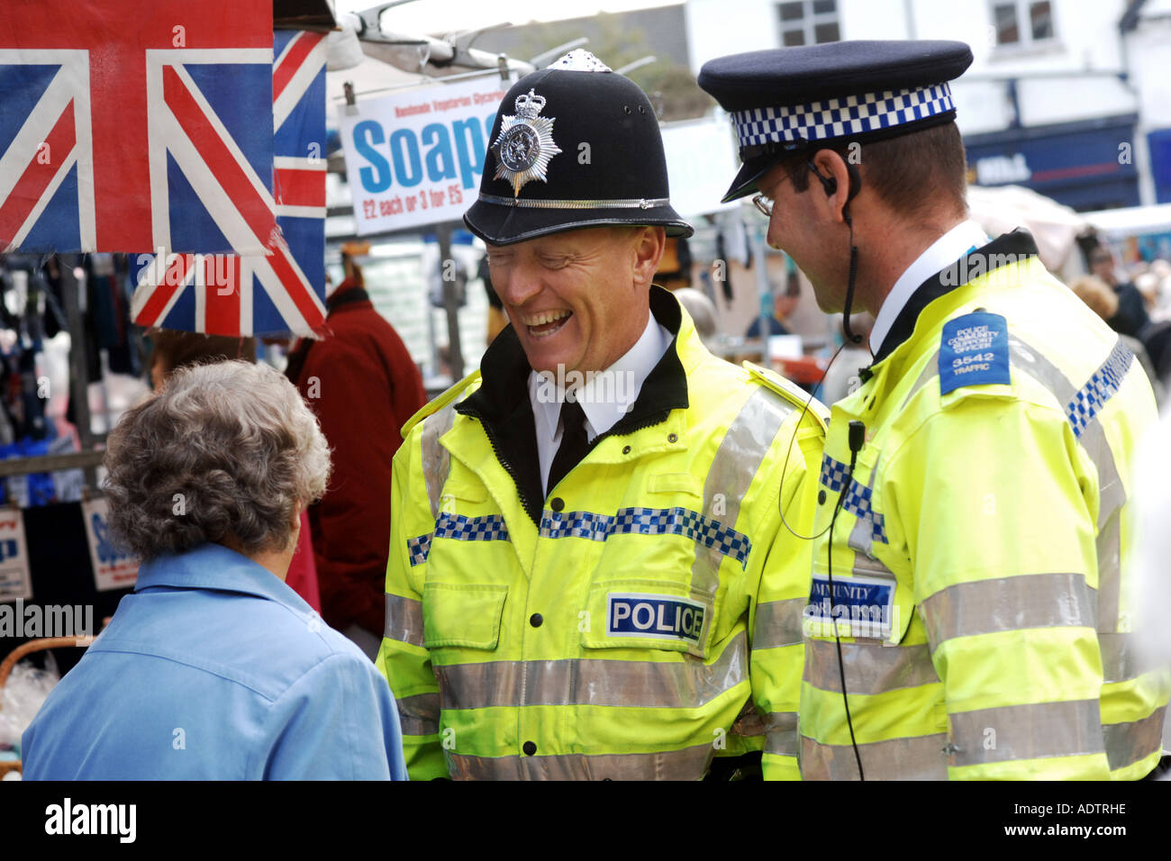 Policeman and Community Safety have a laugh with the public at a local ...