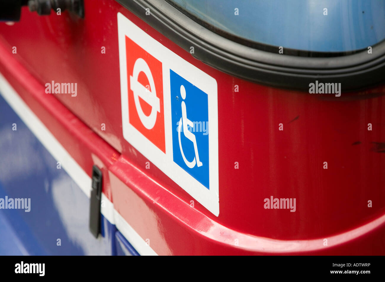 A disabled sign on a London bus, UK Stock Photo - Alamy