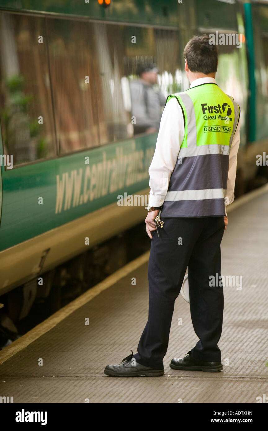 A platform Guard at Gloucester railway station, UK Stock Photo - Alamy