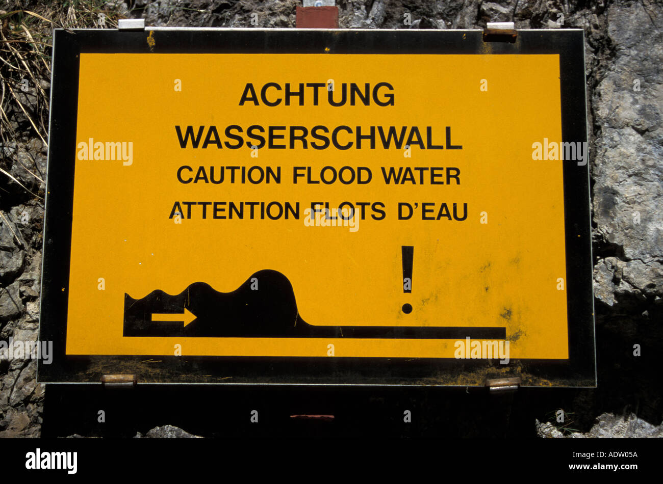 sign caution flood water Stock Photo - Alamy