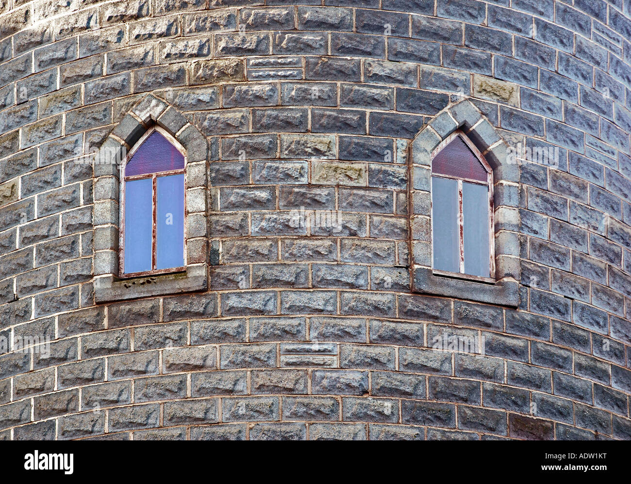 two old windows in the castles tower wall Stock Photo - Alamy
