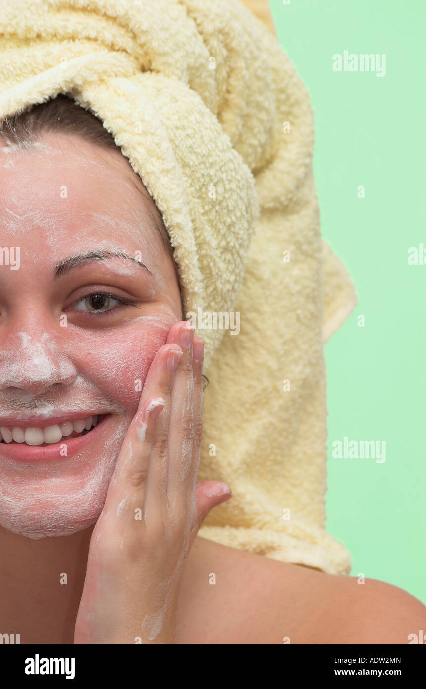 Teen girl washing face hi-res stock photography and images - Alamy